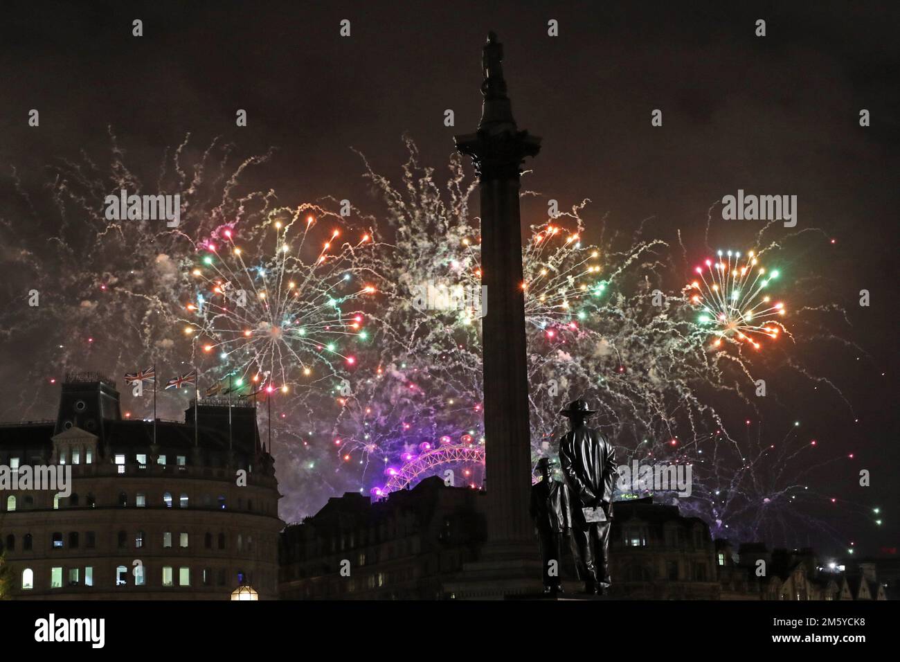 London, UK. 1st Jan, 2023. New Year fireworks in London with Nelson's ...