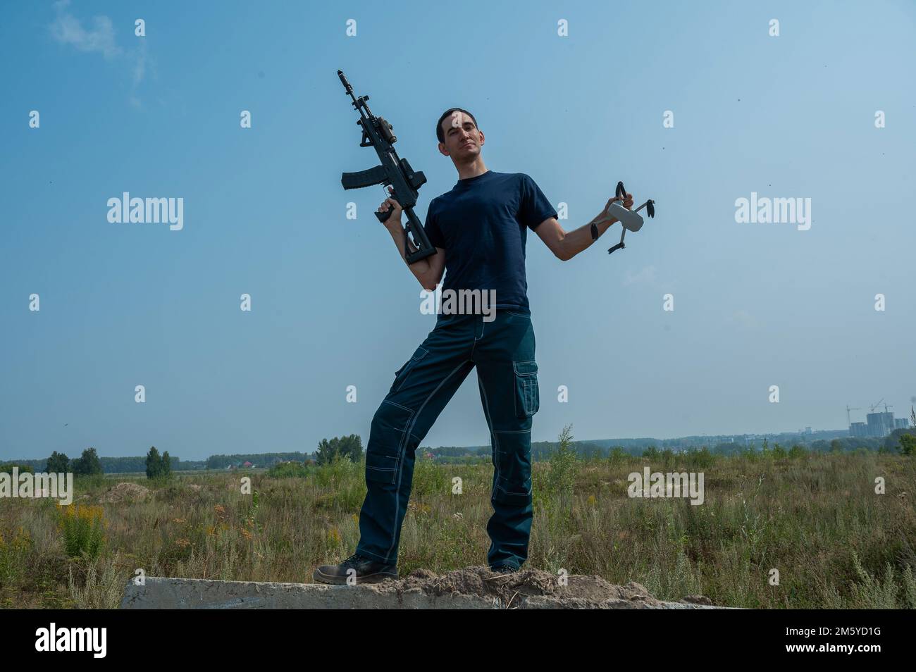 Caucasian man shot down a drone with a shot from a rifle Stock Photo ...