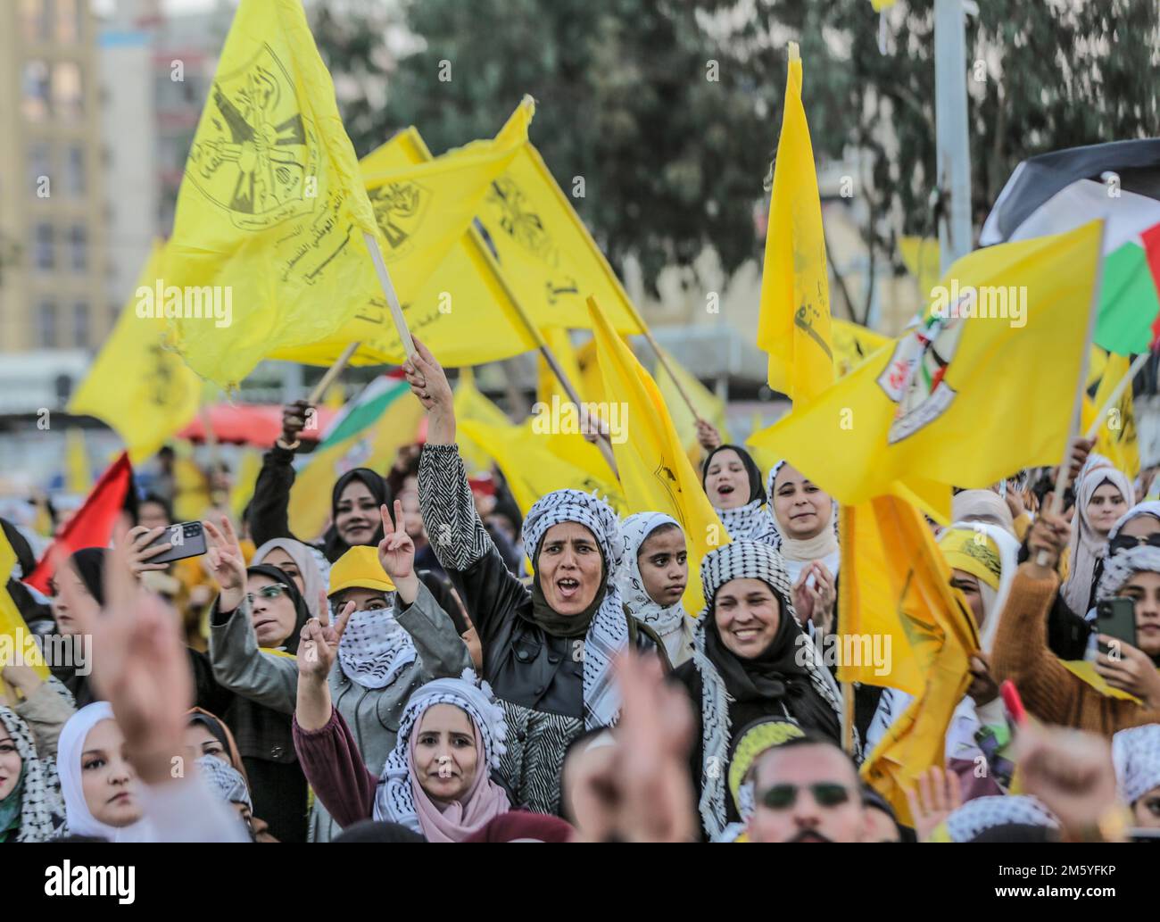 Female supporters of the Palestinian Fatah movement chant slogans and ...