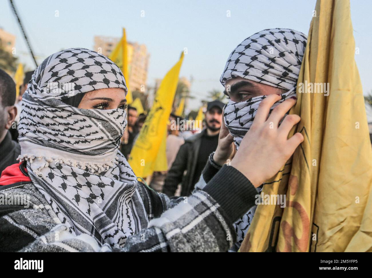 Gaza, Palestine. 31st Dec, 2022. Palestinians wearing keffiyeh during ...