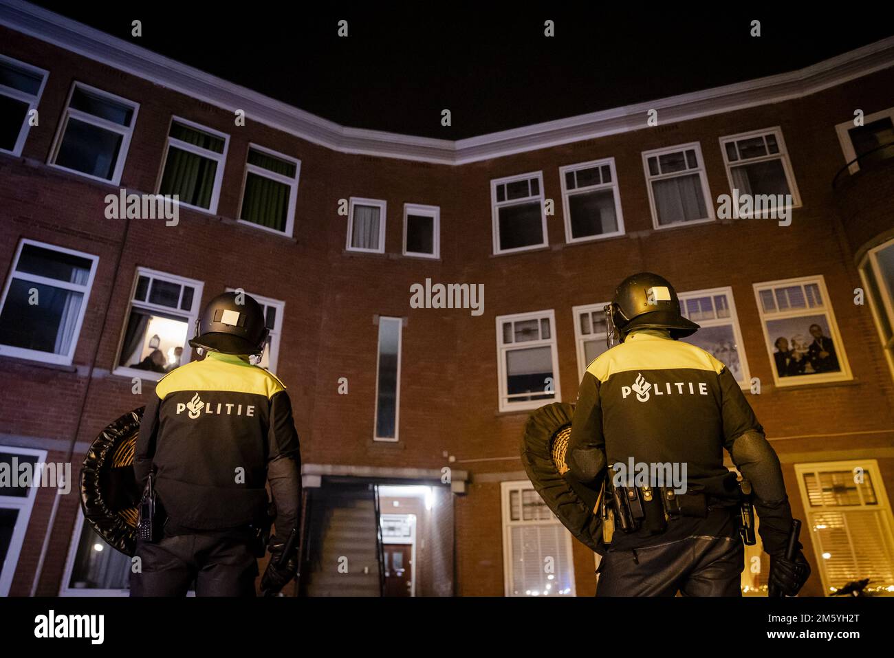 THE HAGUE - Members of the Mobile Unit in action during New Year's Eve ...