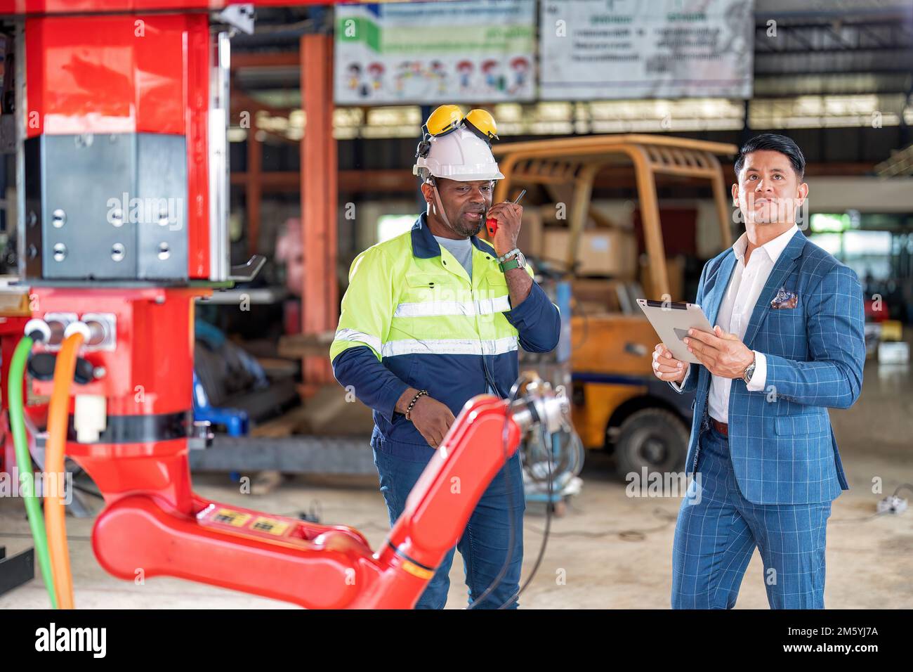 Engineer customer service explain introduction of new design robotic ...