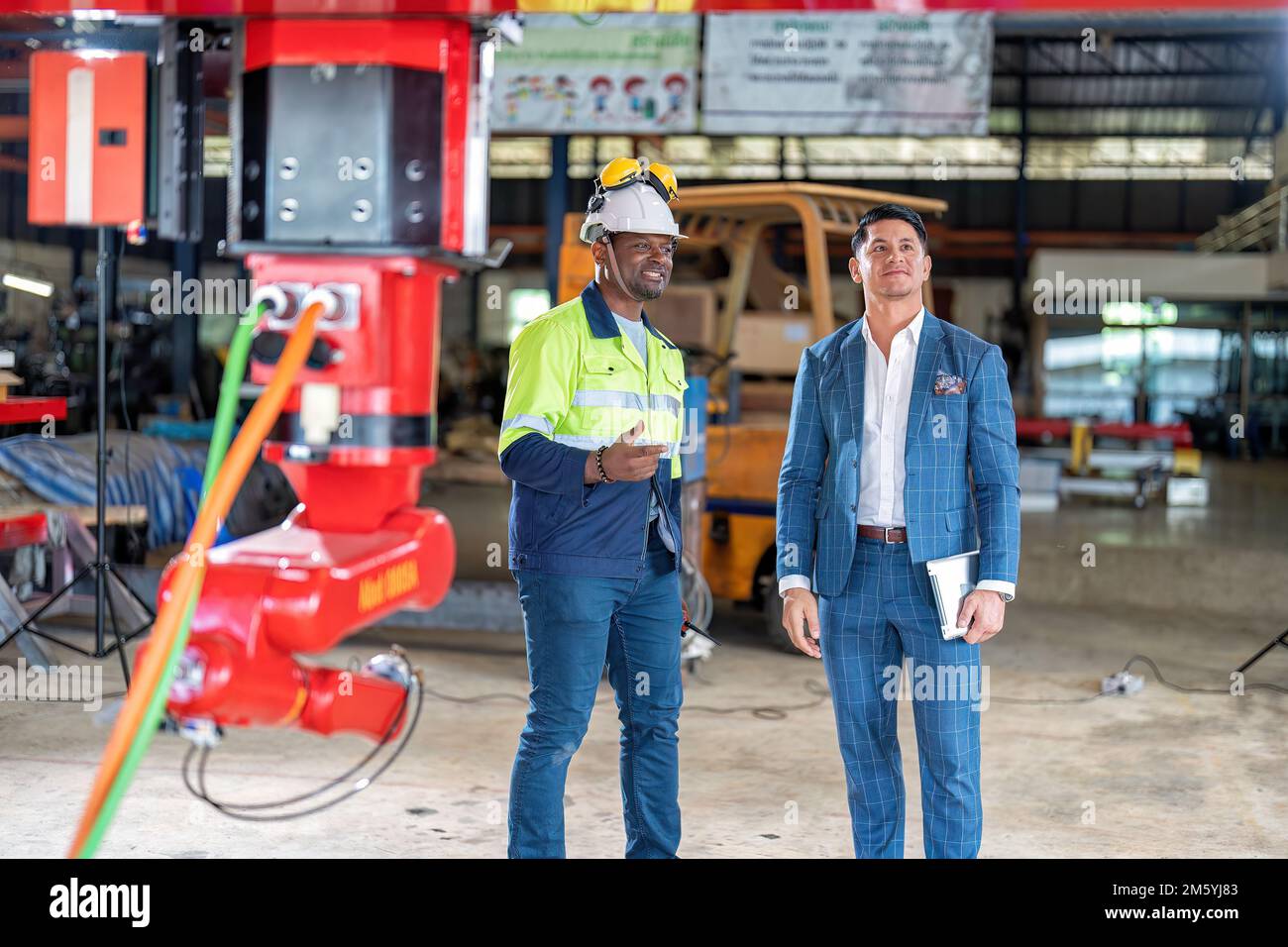 Engineer customer service explain introduction of new design robotic ...