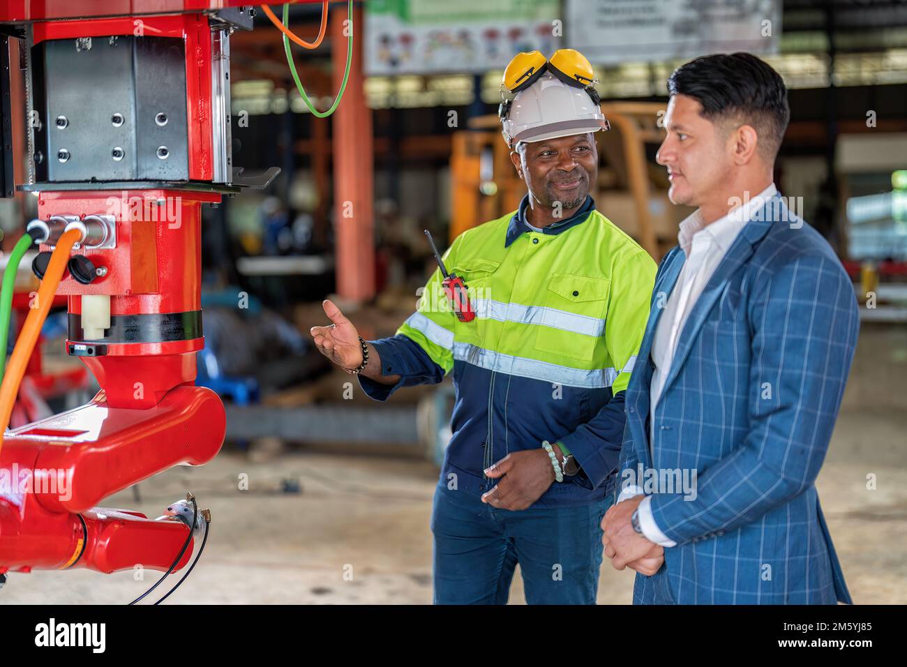 Engineer customer service explain introduction of new design robotic ...