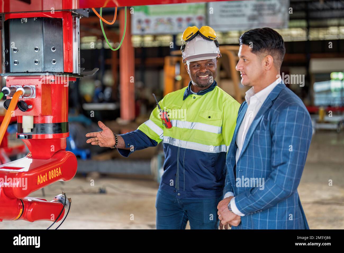 Engineer customer service explain introduction of new design robotic ...