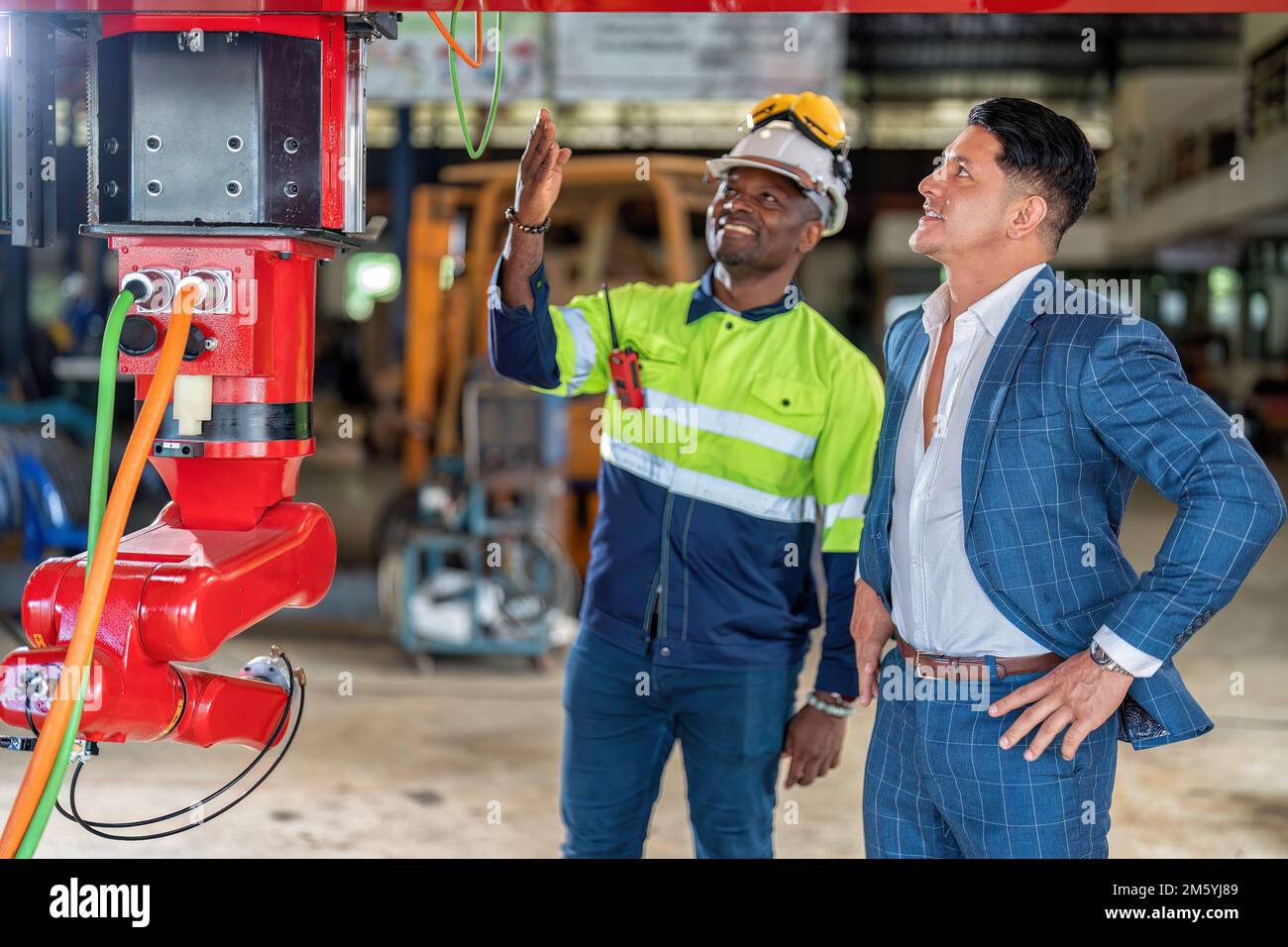 Engineer customer service explain introduction of new design robotic ...