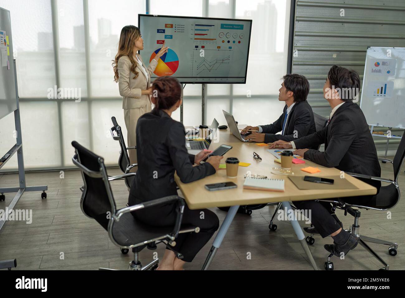 Employee meeting big screen tv presentation conference discussion ...