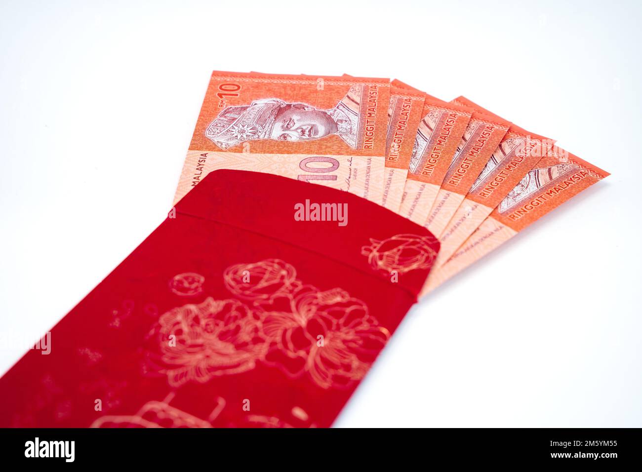 Chinese new year festival red envelope with Ringgit Malaysia note on ...