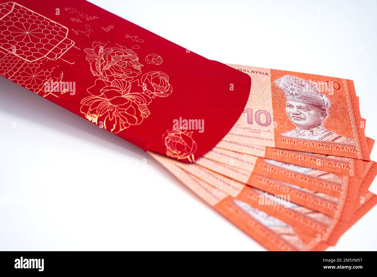 Chinese new year festival red envelope with Ringgit Malaysia note on ...