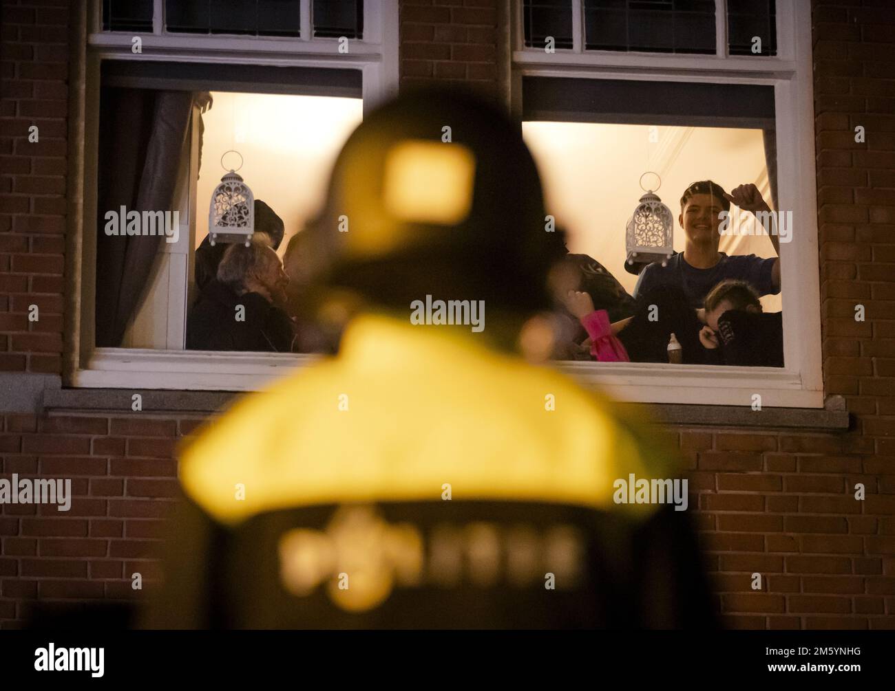 THE HAGUE - Members of the Mobile Unit in action during New Year's Eve ...
