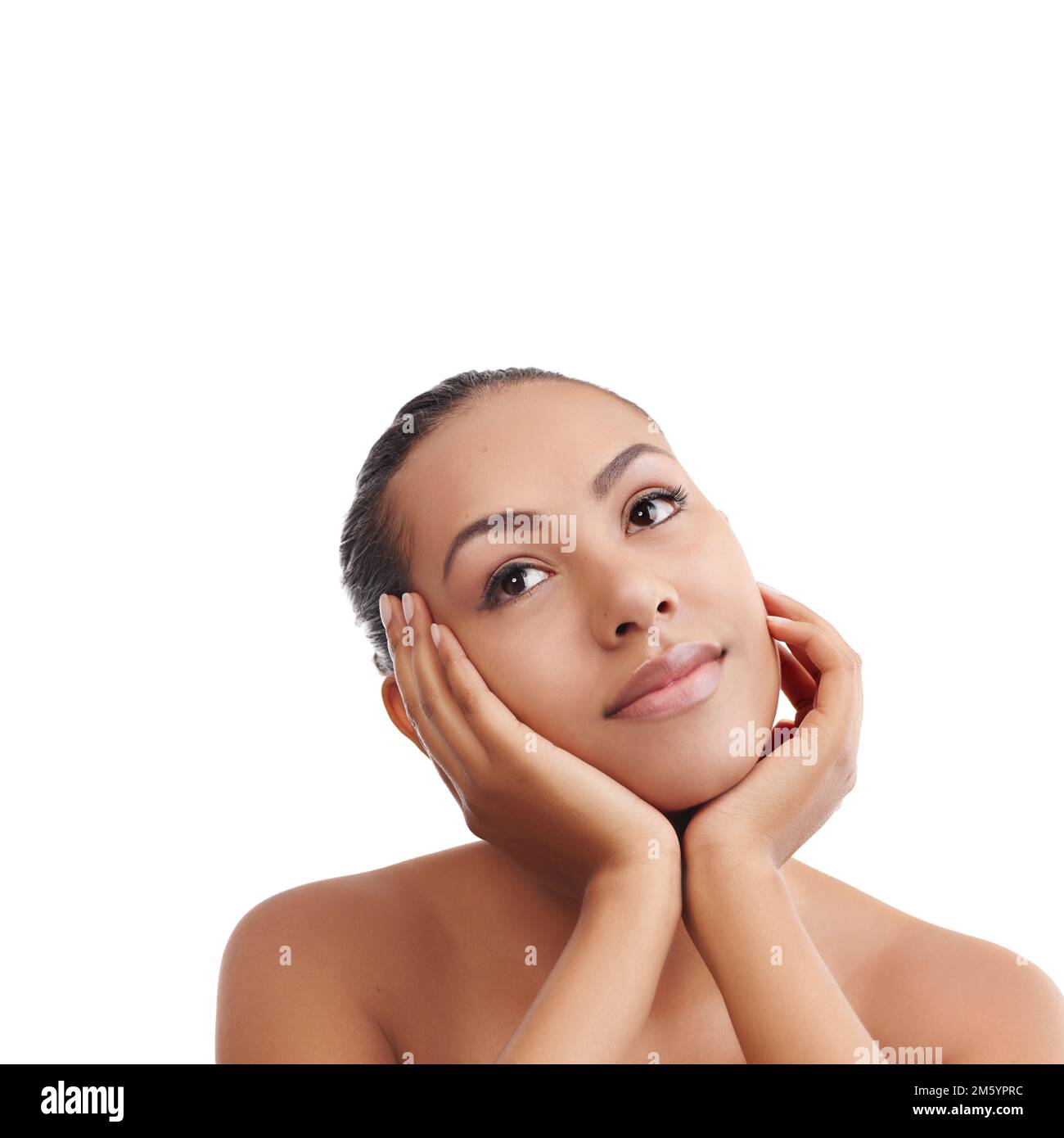 Enjoying the sensation of smooth skin. a young woman with beautiful ...