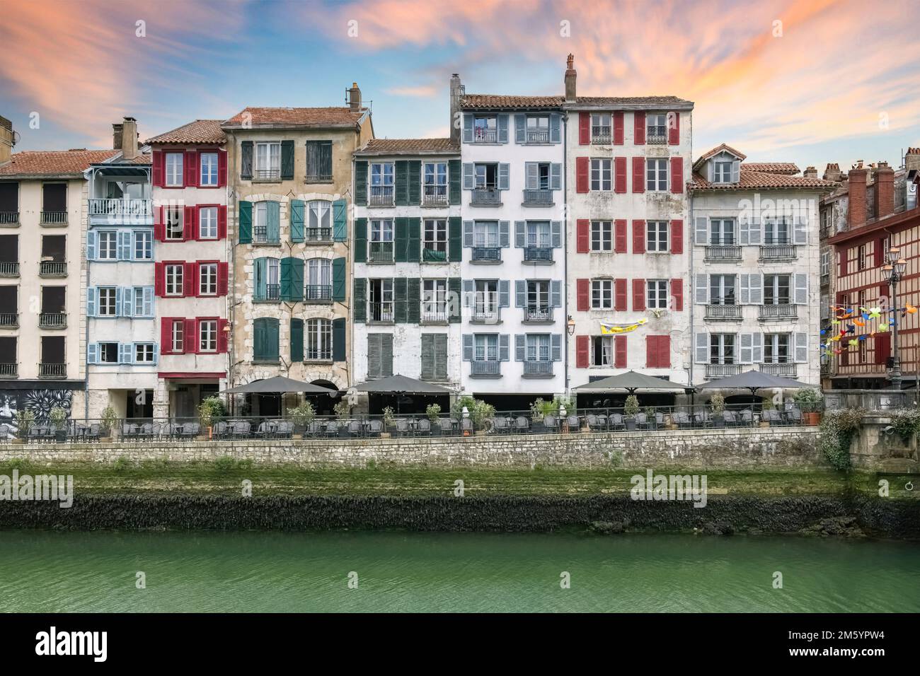 Bayonne in the pays Basque, typical facades on the river Nive Stock ...