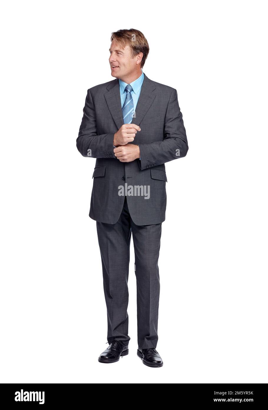 Making a statement with his suit. Studio shot of a well-dressed ...