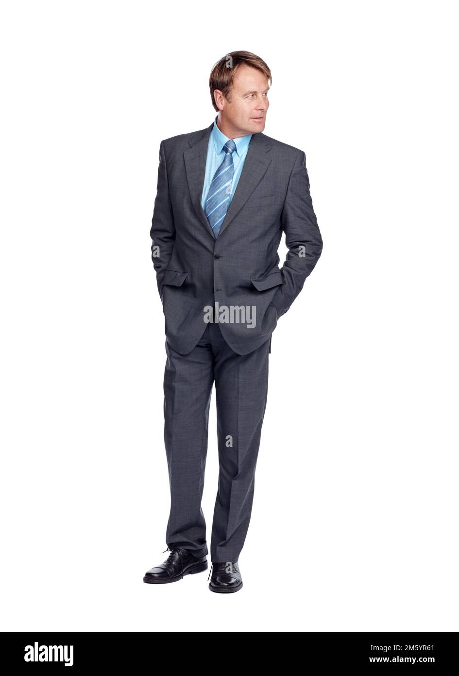 Mixing style and success. Studio shot of a well-dressed businessman ...