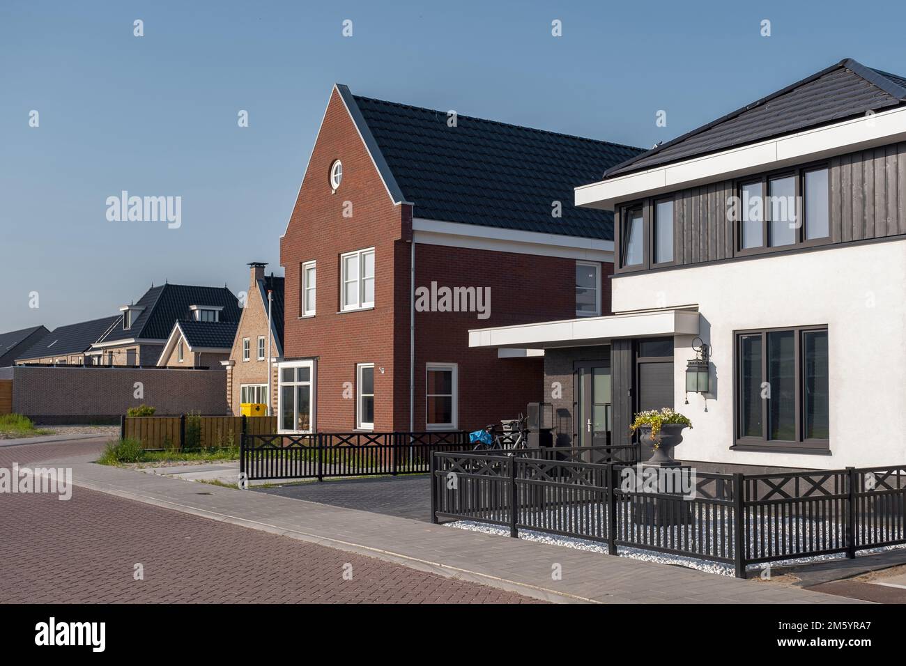 Dutch Suburban area with modern family houses, newly build modern ...
