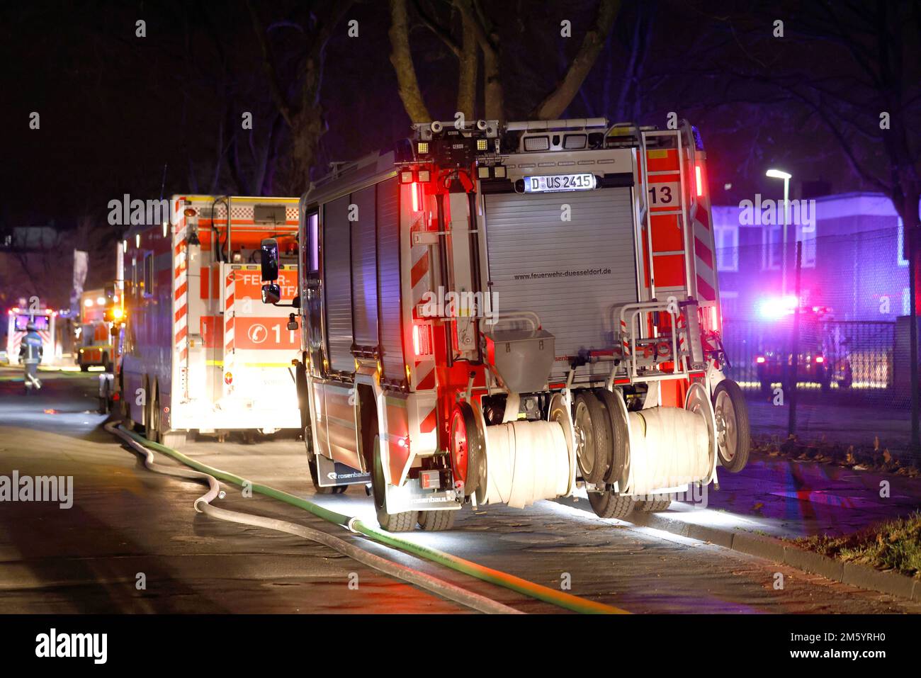 Duesseldorf, Germany. 01st Jan, 2023. Fire engines stand in the street ...