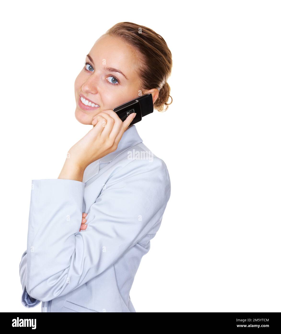 Happy female business executive talking over phone on white. Cute young ...