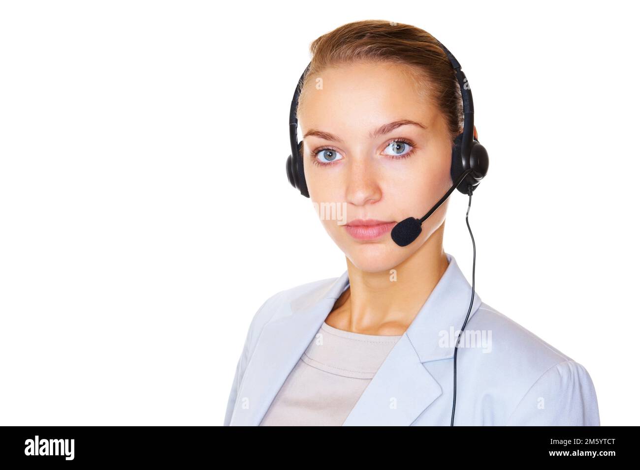 Business female using a headset isolated on white background. Young ...