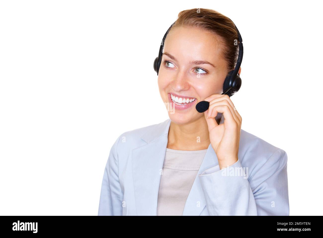Smiling business woman speaking on headset on white. Portrait of a ...