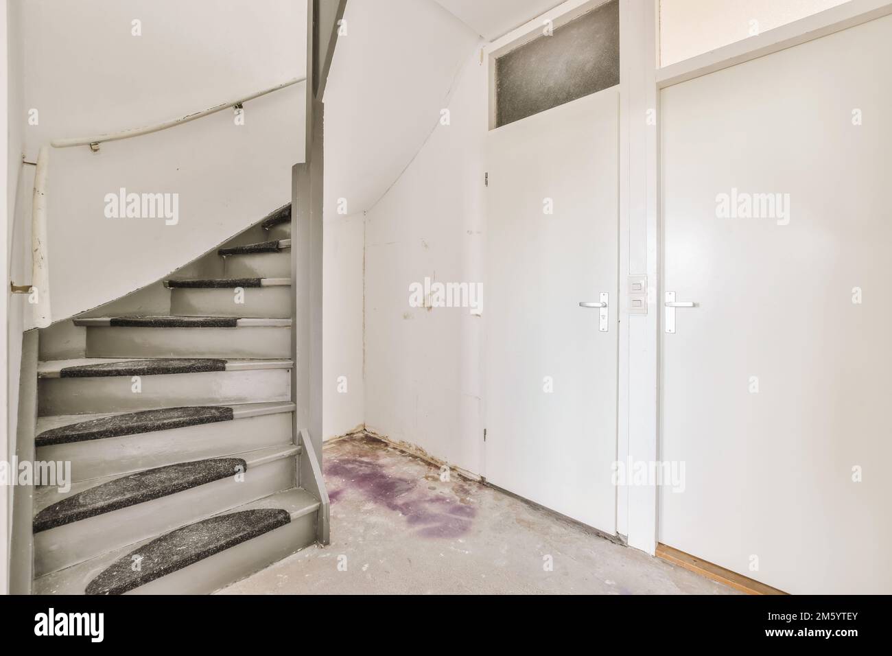 some stairs in an empty room with no one person on the floor or people ...