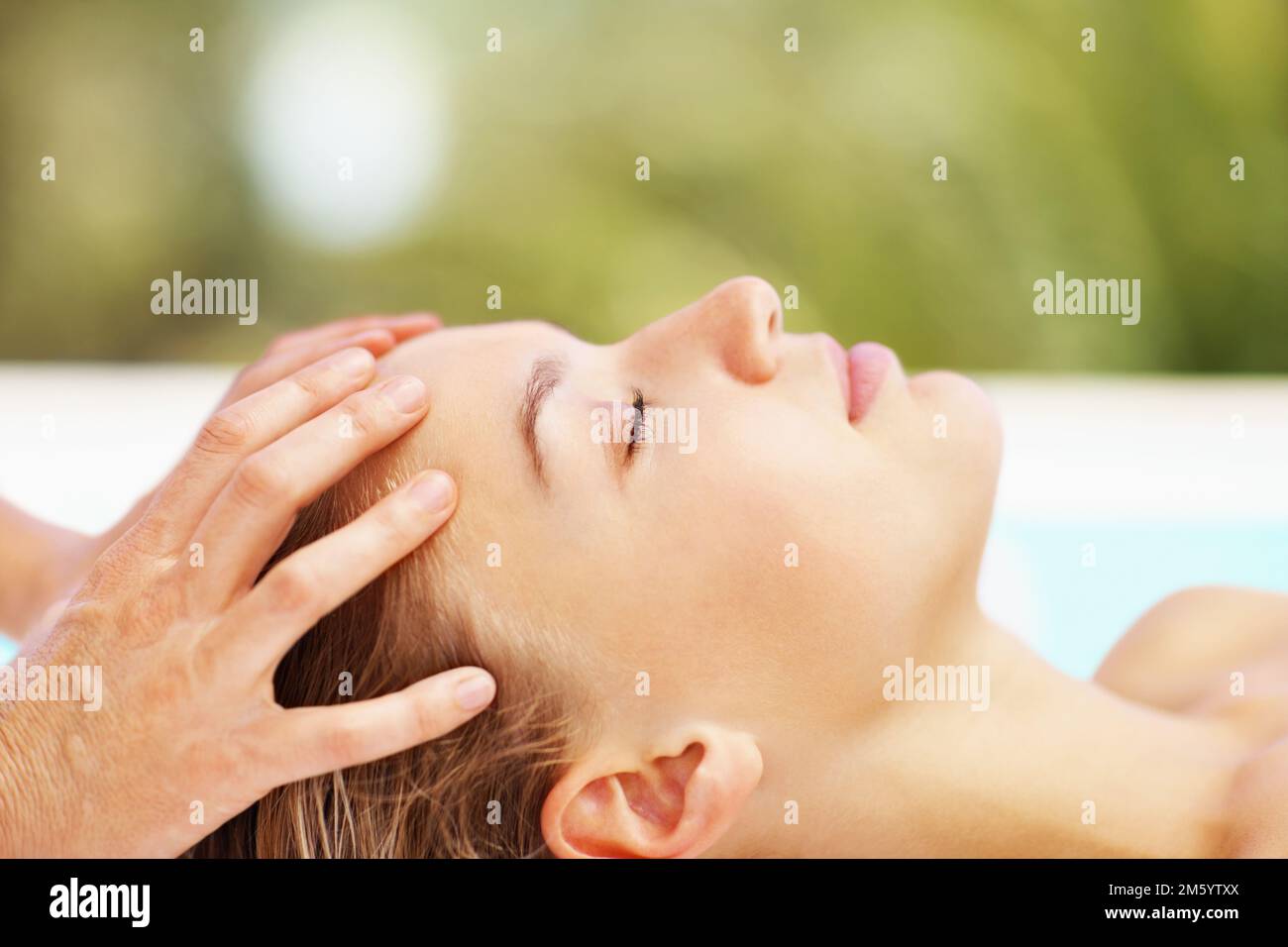 Closeup Image Of A Female Receiving A Head Massage Loseup Profile