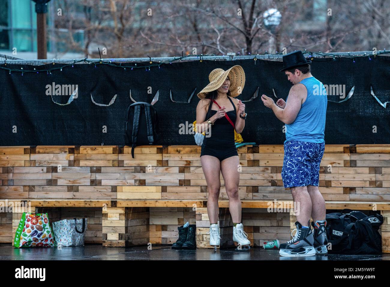 Toronto, Canada. 31st Dec, 2022. Ice skaters dressed in summer clothes ...