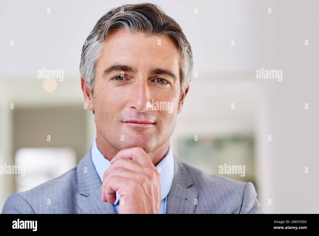 Hmm, thinking of my next goal. Headshot of a confident mature man ...