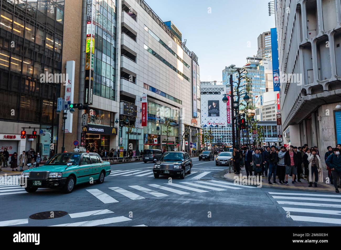 Tokyo, Japan - January 8, 2020. Many people walking along the busy ...