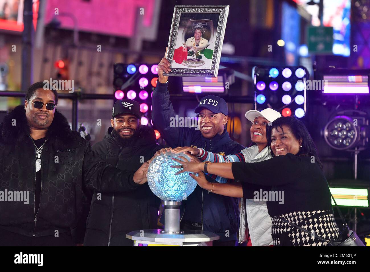 New York, USA. 31st Dec, 2022. New York City Mayor Eric Adams holds up ...