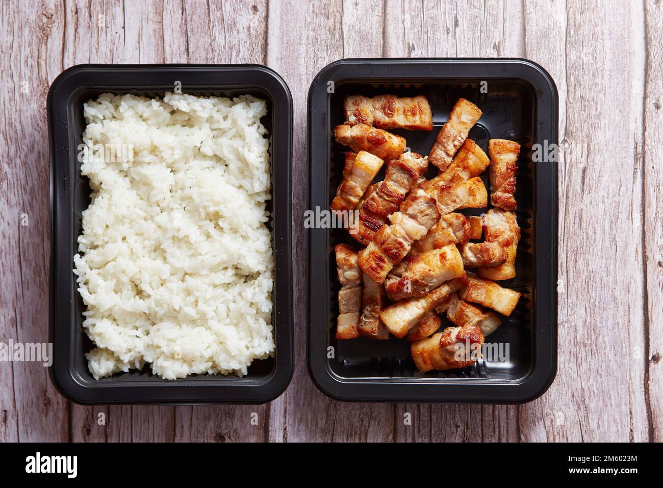 Rice and meat in a takeaway lunch box Stock Photo - Alamy