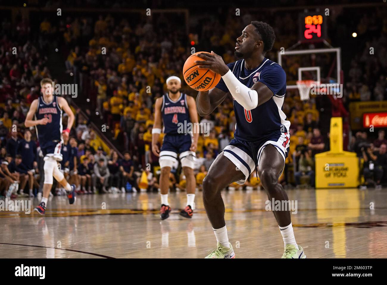 University of Arizona guard Courtney Ramey (0) attempts a shot in the ...