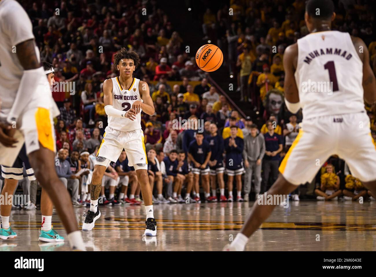 Arizona State guard Austin Nunez (2) passes the ball in the second half ...