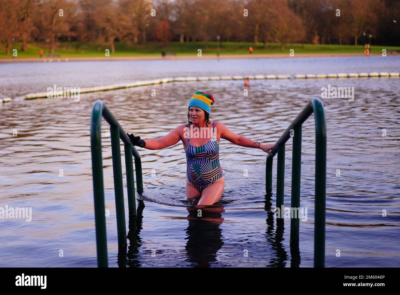 A woman takes an early morning swim on New Year's Day at the Serpentine ...