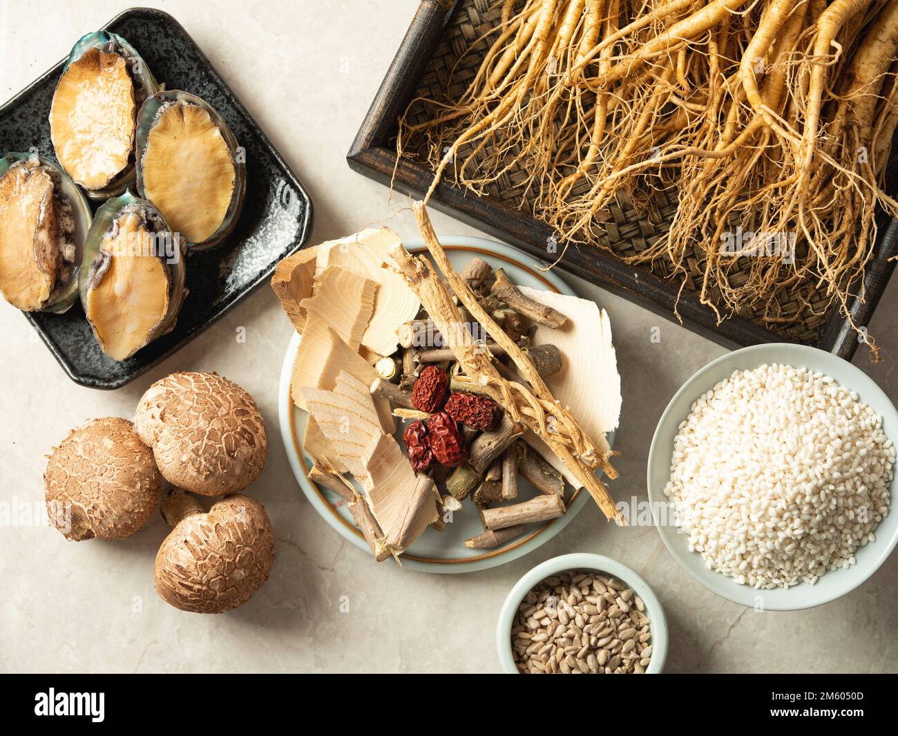 Samgyetang ingredients, Ginseng and fresh abalone Stock Photo - Alamy