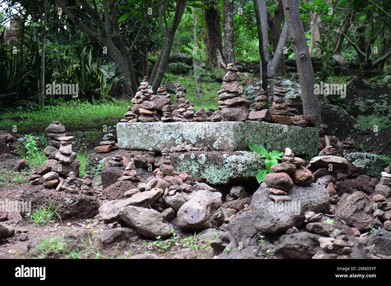 Thai people and foreign travelers build rock stone tower for respect ...