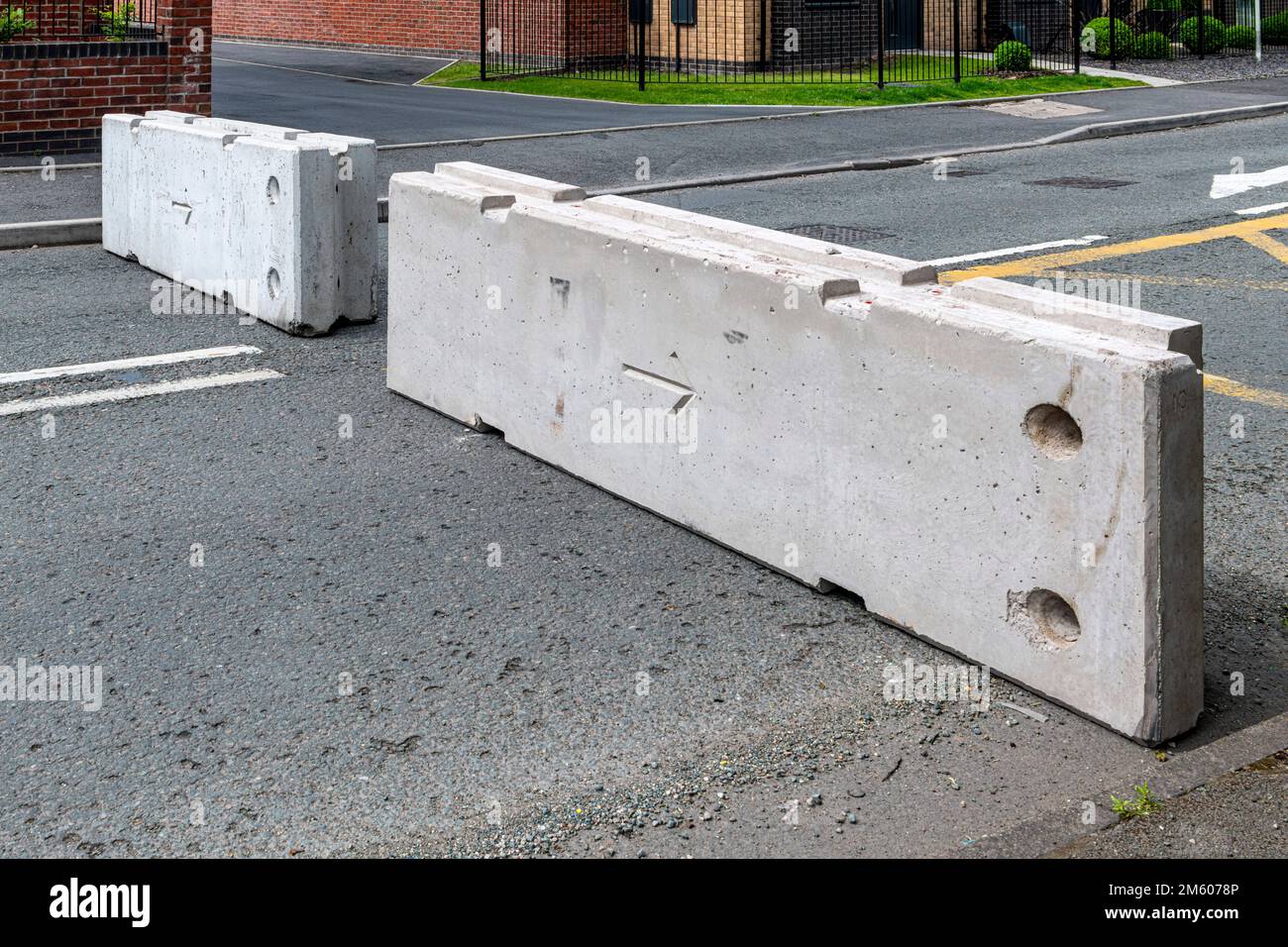 Road closed with concrete blocks Stock Photo - Alamy