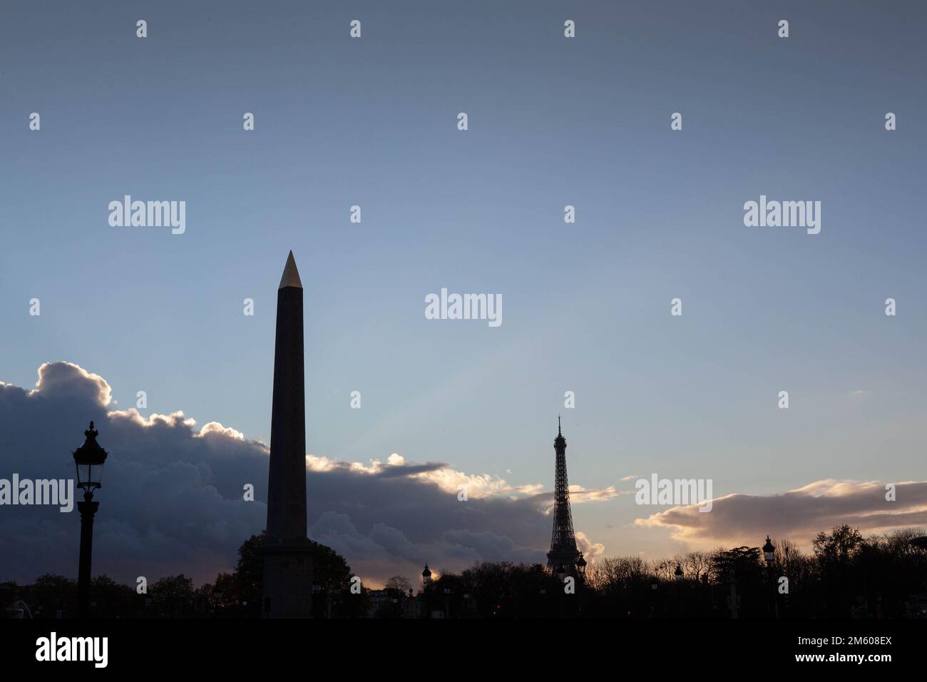 Obelisk and Eiffel Tower at dusk Stock Photo - Alamy