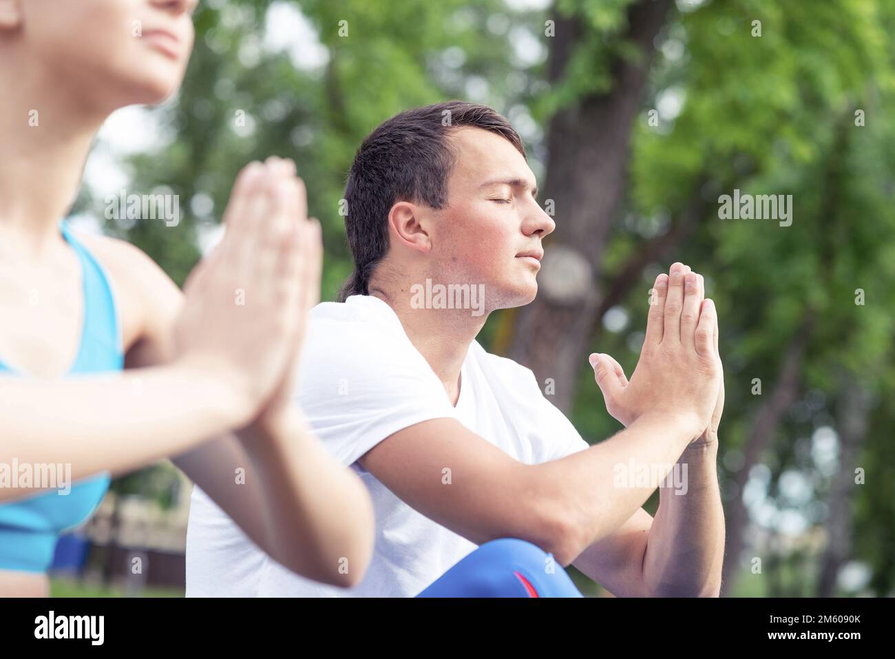 Content peaceful young couple with closed eyes Stock Photo - Alamy