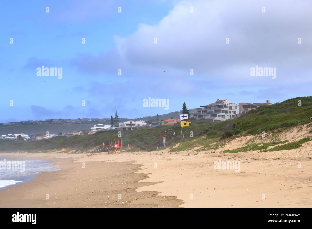 Lifeguard equipment in yellow and red colors and shark danger on the ...