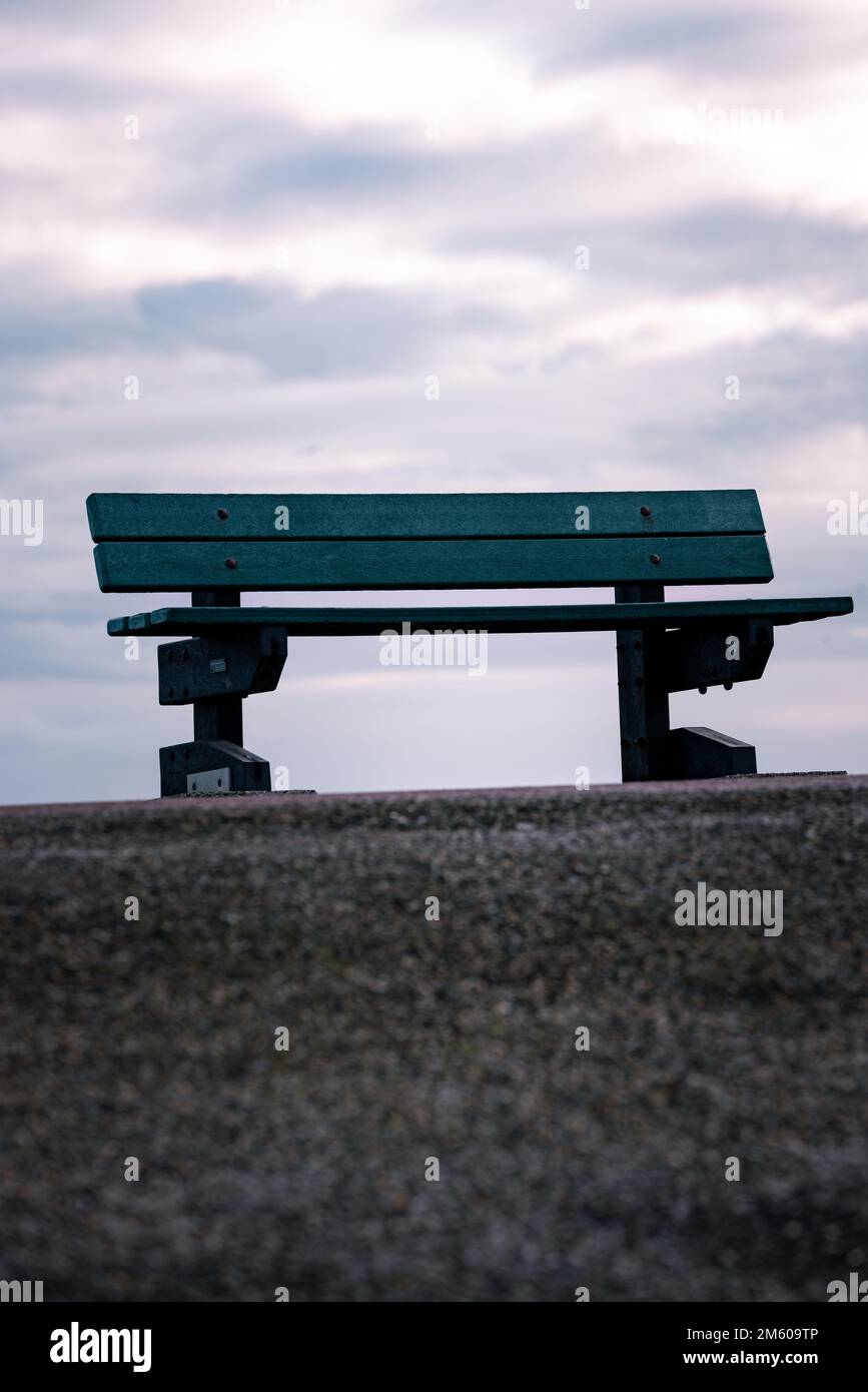 Bench on the horizon in clouds Stock Photo - Alamy