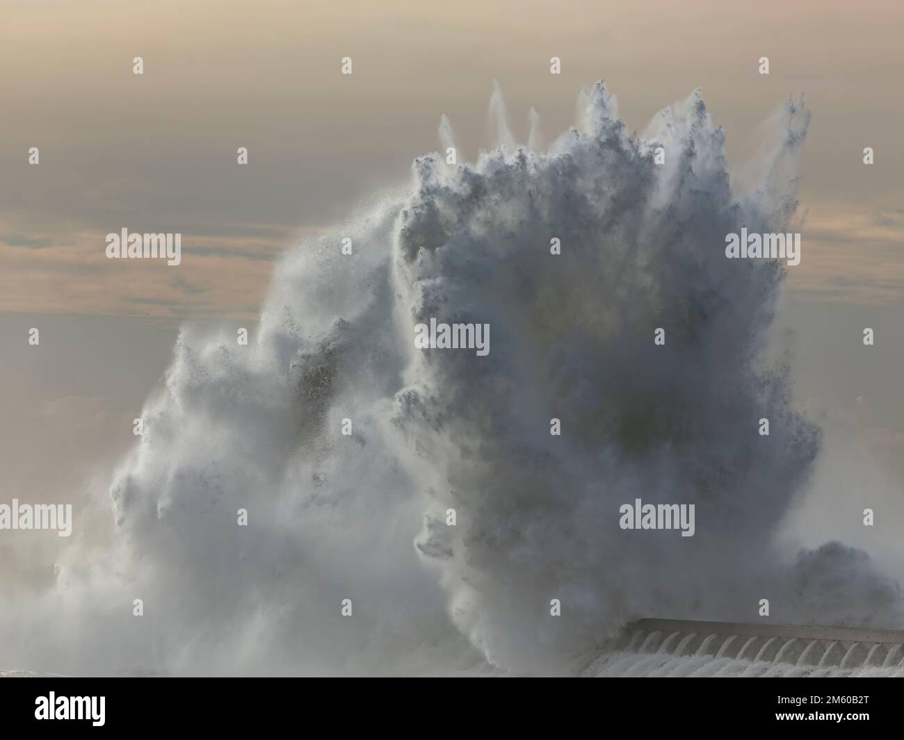 Huge wave splash. Douro river mouth south pier. End of the day light ...