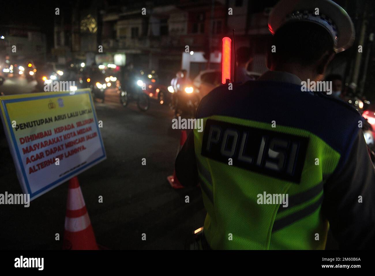 Police personnel seen guards the traffic jam during New Year 2023 ...