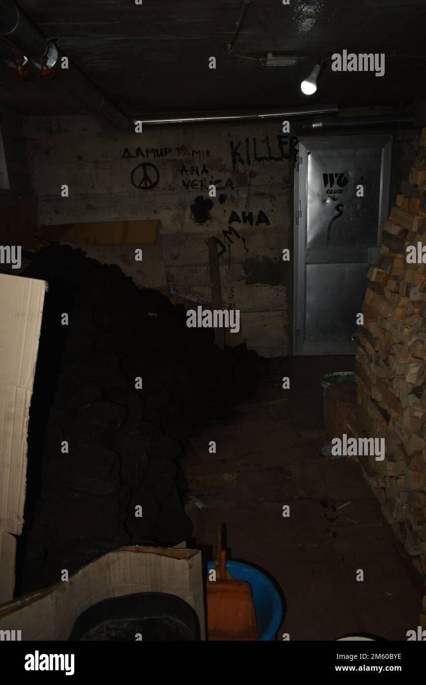 Stack of coal for heating in the basement Stock Photo - Alamy