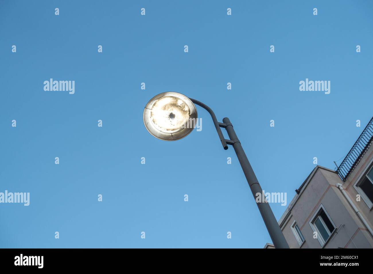 A low angle shot of a street lamp under a clear blue sky Stock Photo ...