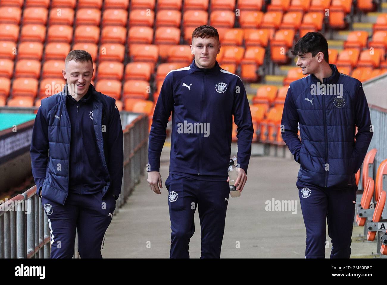 Shayne Lavery #19 of Blackpool, Sonny Carey #16 of Blackpool and ...