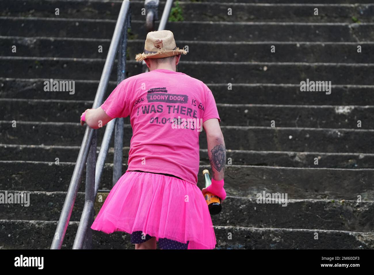 Revellers get ready ahead of the Loony Dook New Year's Day dip in the ...