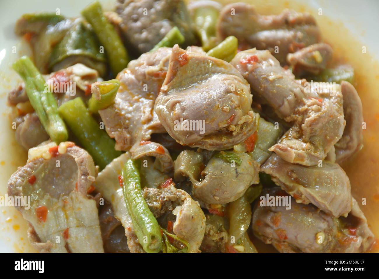 spicy stir-fried chicken gizzard couple liver with yard long bean and ...