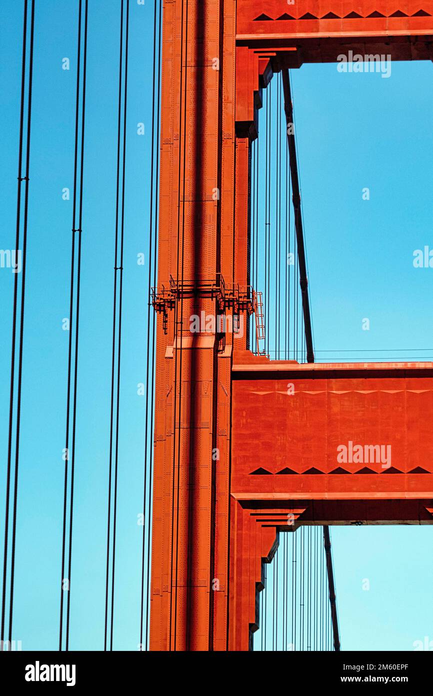 Orange pylon and steel cables of the suspension bridge, detail, Golden ...