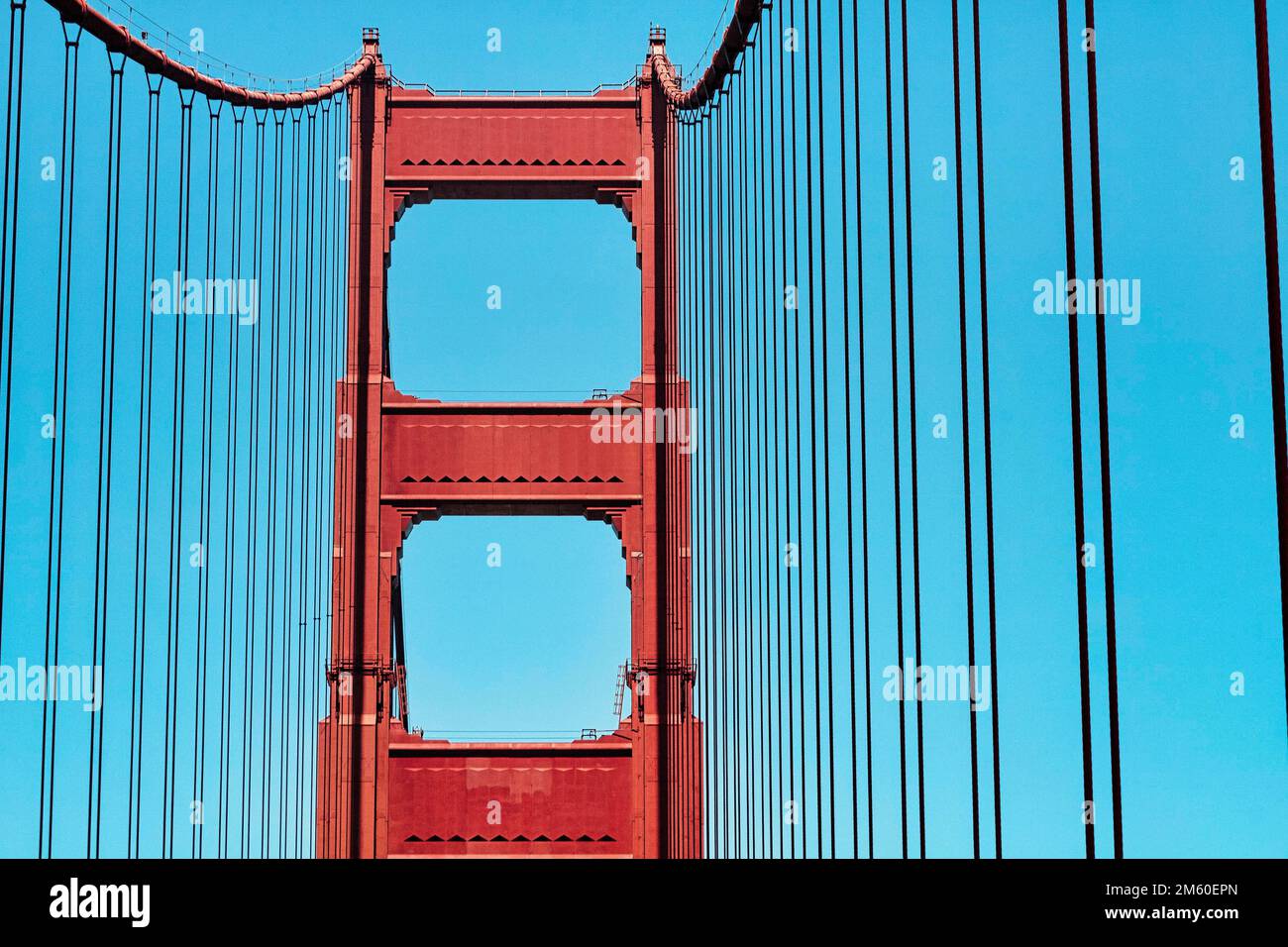 Orange pylon and steel cables of the suspension bridge, detail, Golden ...