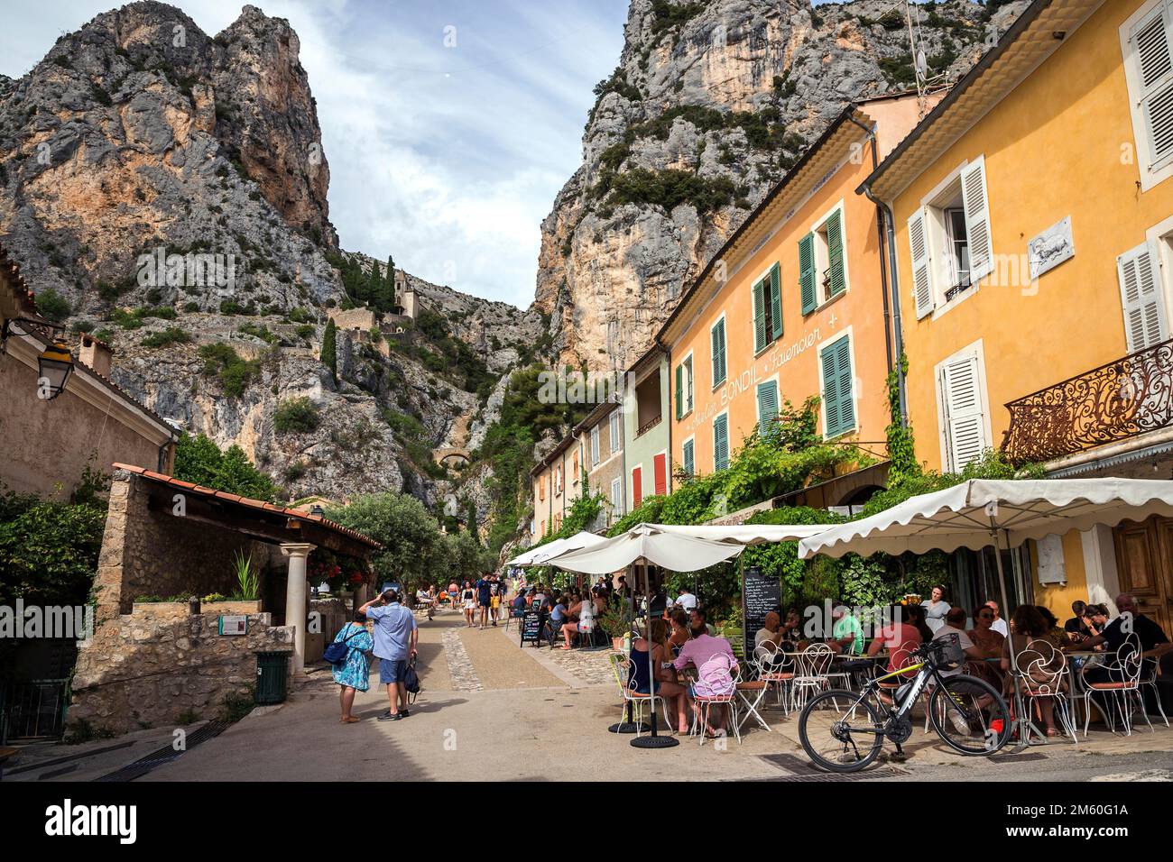 Alley with restaurants in Moustiers-Sainte-Marie, Departement Alpes-de ...